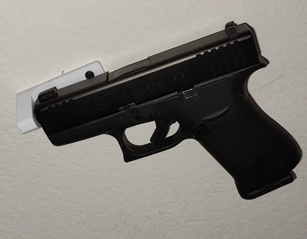 Universal 9mm / Glock Wall Mount by KJ - MakerWorld