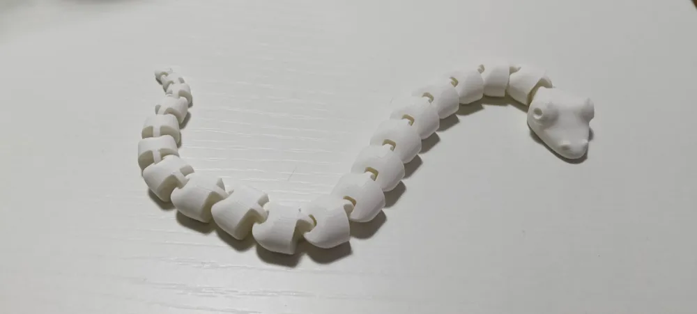 SNAKE FLEXI ANIMAL Articulated by DavideMaker3D MakerWorld: Download ...