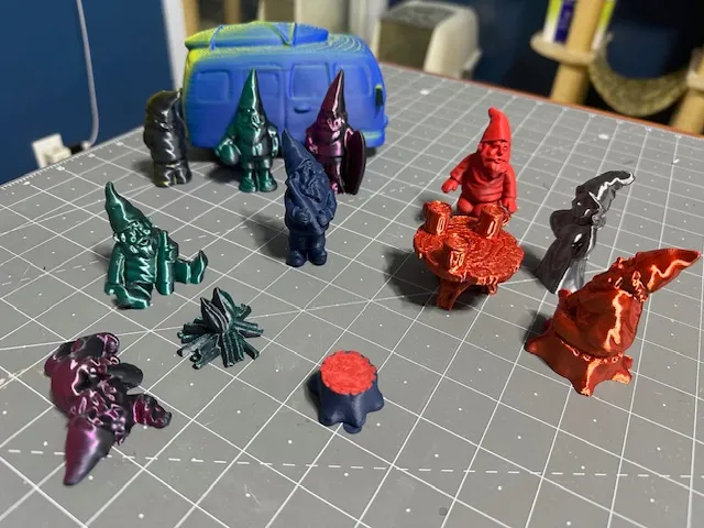 Mini (knees on log) gnome by SigOS - MakerWorld