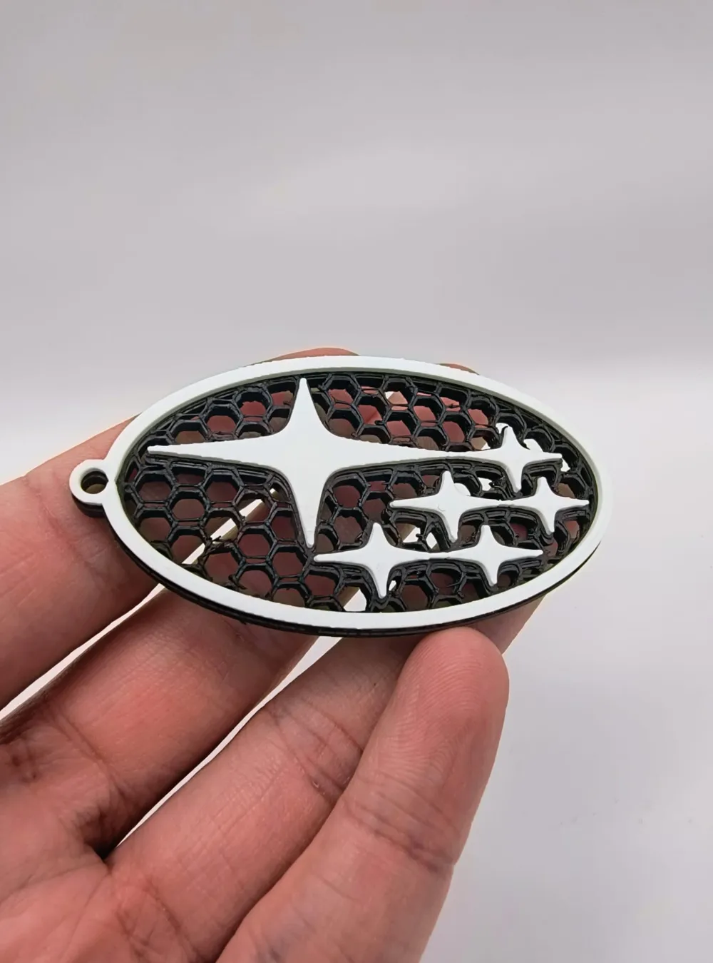 Subaru logo honeycomb keychain - Free 3D Print Model - MakerWorld