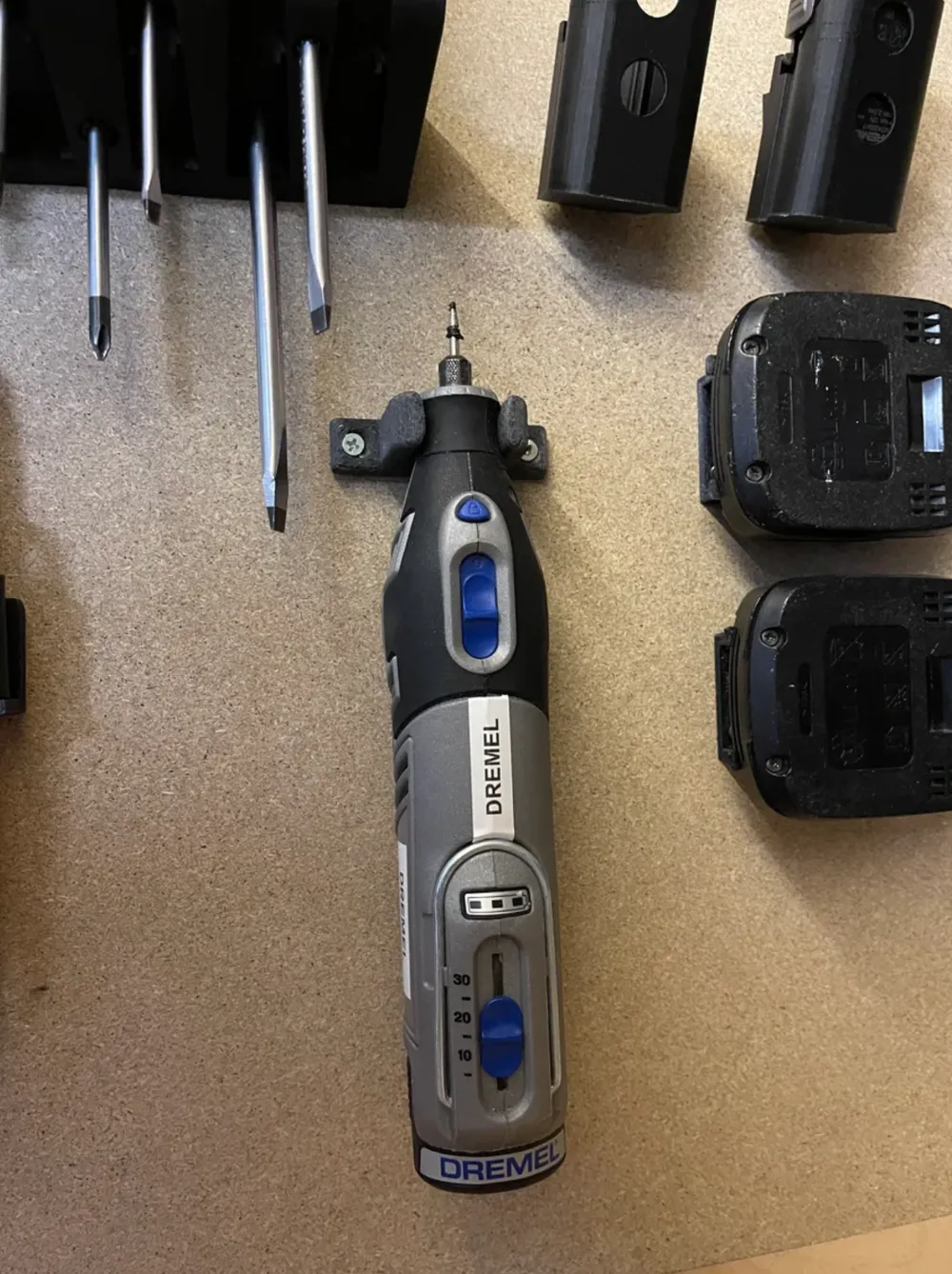 Universal Dremel Wall Mount by JonathanArand - MakerWorld