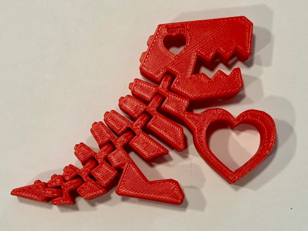 flexi rex holding heart valentine's - Free 3D Print Model - MakerWorld