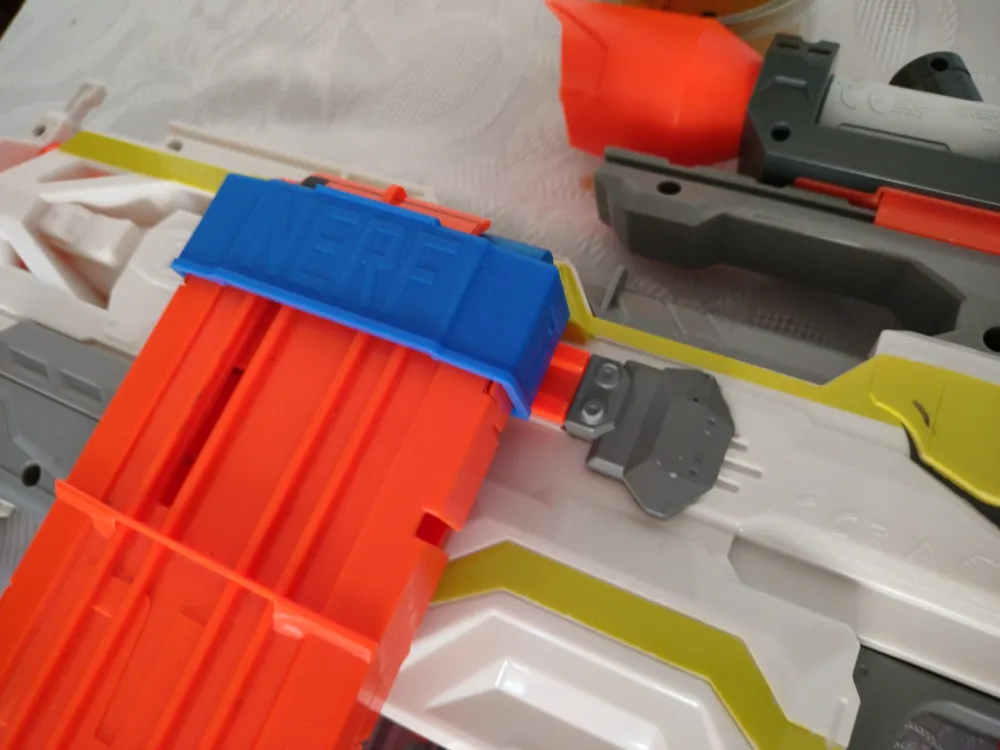 Nerf magazine holder Remixed by Karmelek - MakerWorld