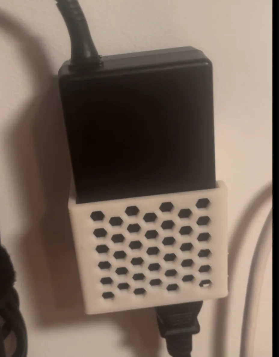 Wall Mount for charging brick for HP laptop by Ekhthree - MakerWorld