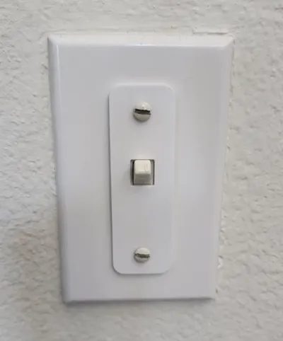 Light Switch Cover - Lock Position - Low Profile! by CryoSlang - MakerWorld