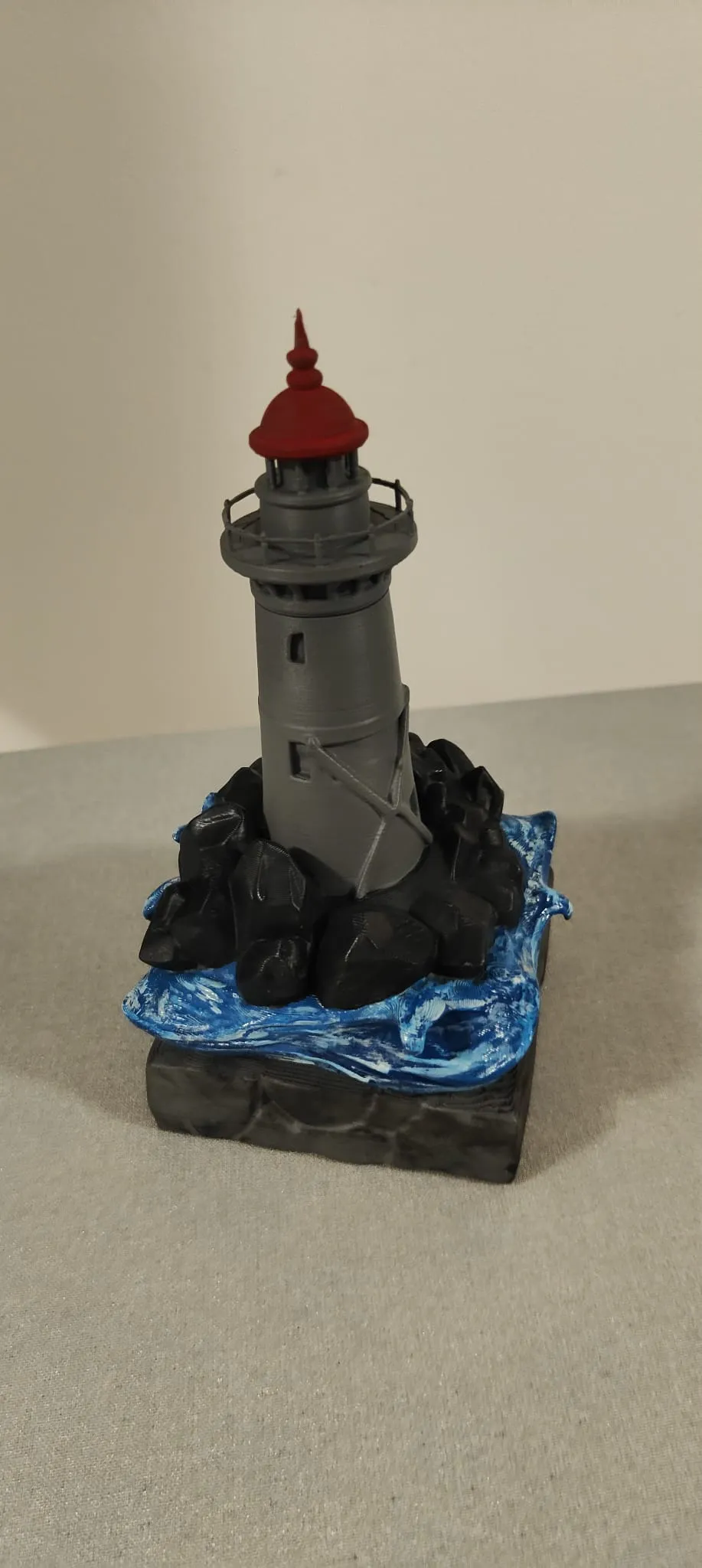 Small diorama of a lighthouse on rocks at sea by Frenk MakerWorld ...