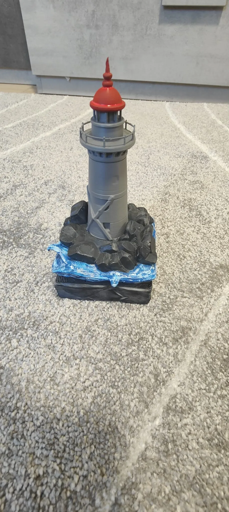 Small diorama of a lighthouse on rocks at sea by Frenk MakerWorld ...