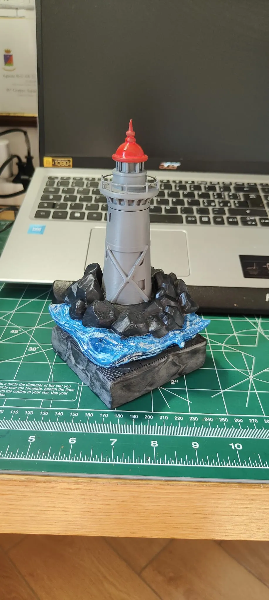 Small diorama of a lighthouse on rocks at sea by Frenk MakerWorld ...