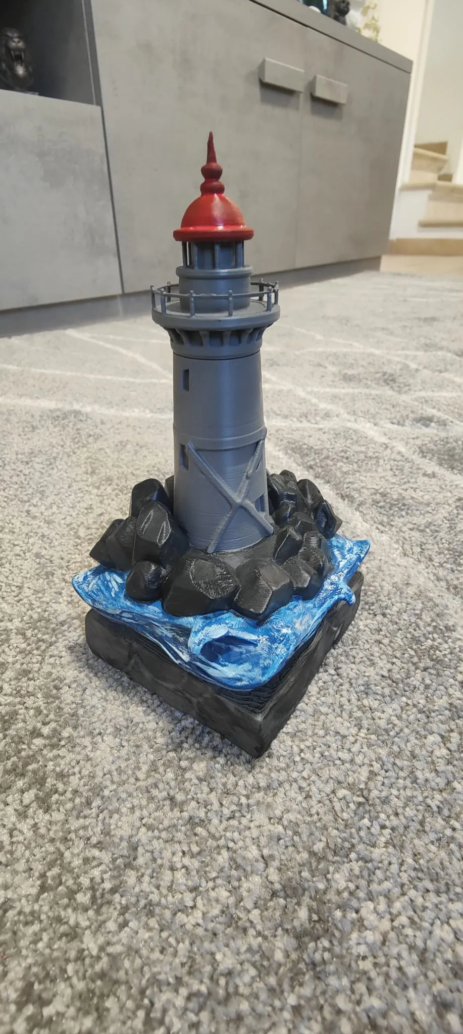 Small diorama of a lighthouse on rocks at sea by Frenk MakerWorld ...