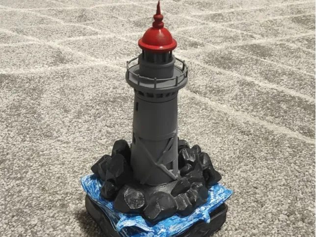 Small diorama of a lighthouse on rocks at sea by Frenk MakerWorld ...
