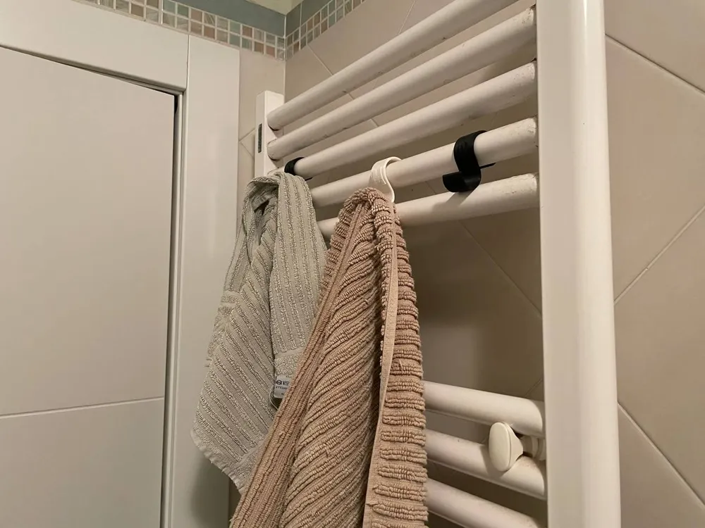 HeatHook - A sleek, radiator-mounted robe hook that warms your towels ...