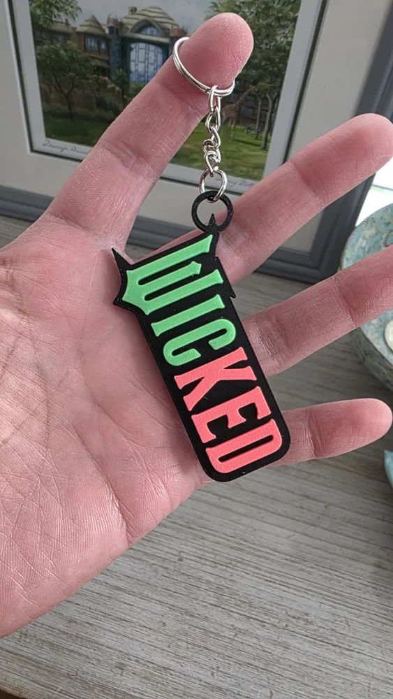 Wicked logo keychain - Free 3D Print Model - MakerWorld