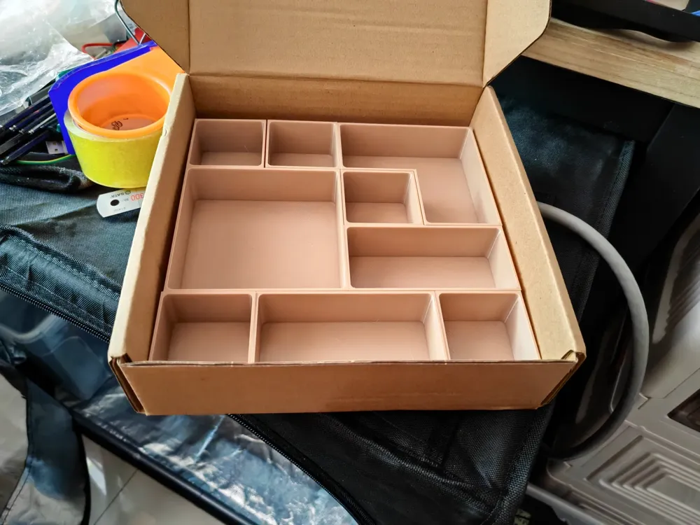 A small, partitioned storage box U2933 compatible with 99% of flip-top ...