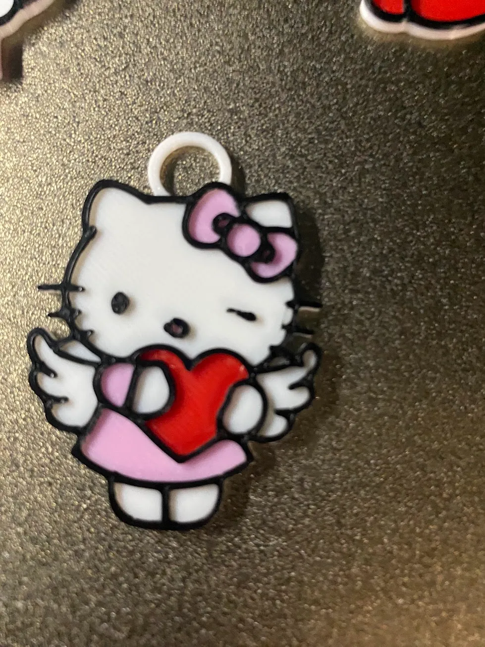 KUROMI and hello kitty keychains by Enova 3D MakerWorld: Download Free ...