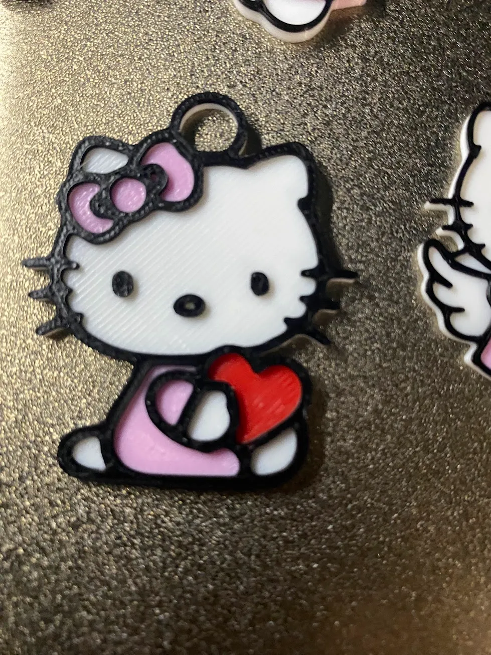 KUROMI and hello kitty keychains by Enova 3D MakerWorld: Download Free ...