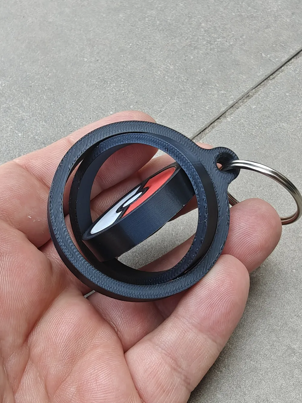 Pokéball Gyroscopic Keychain Spinner - Free 3D Print Model - MakerWorld
