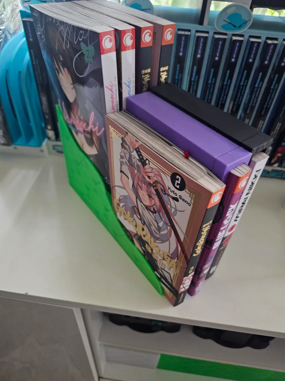 Two-tiered Manga/Book Stand - Free 3D Print Model - MakerWorld