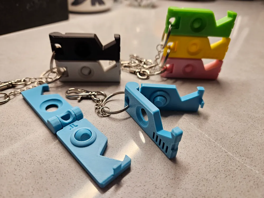 Fidget Phone Holder for Keychain by Loffe MakerWorld: Download Free 3D ...