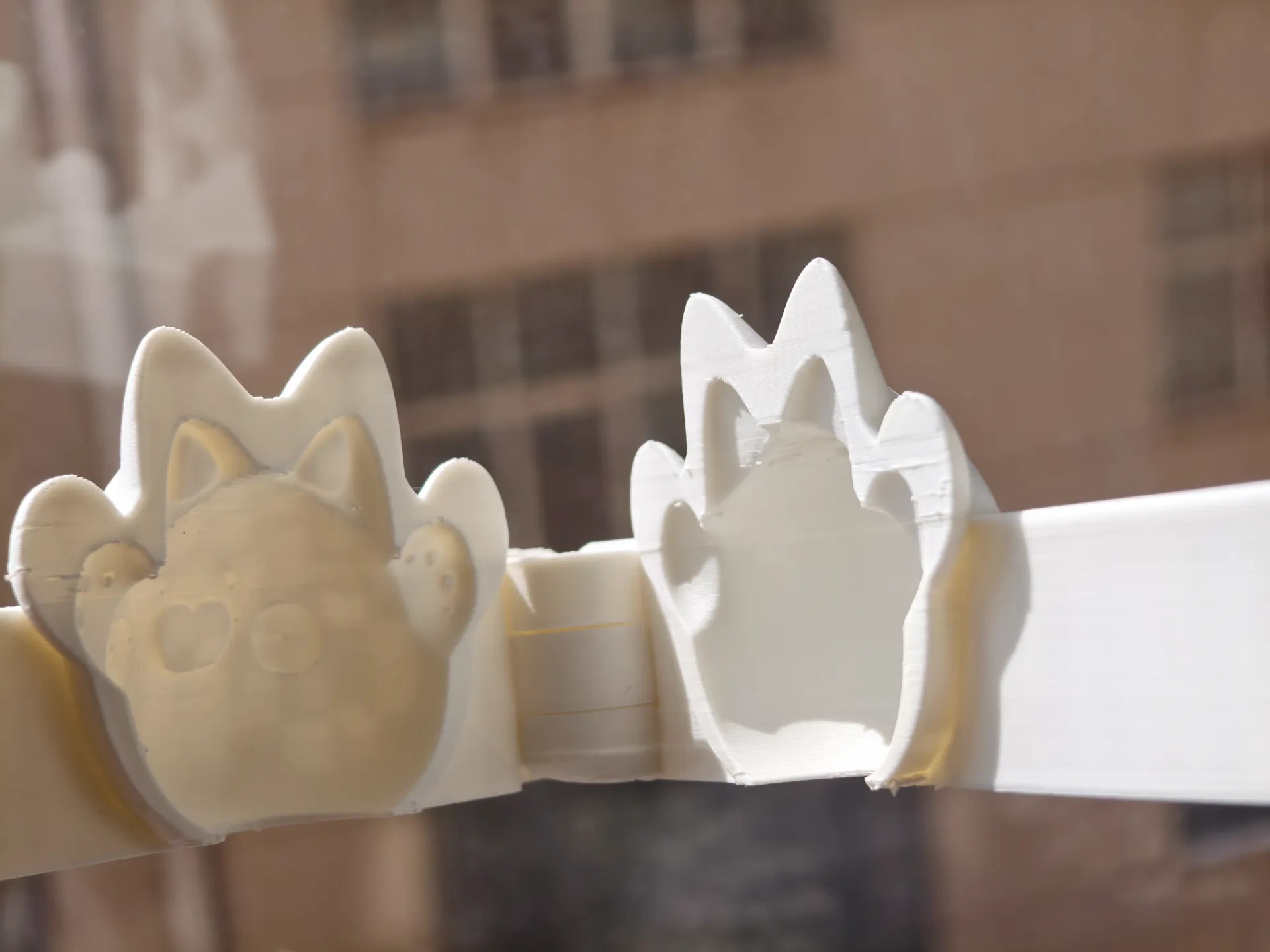 Kitten snowmen, snow molds. The first one is larger, about the size of ...