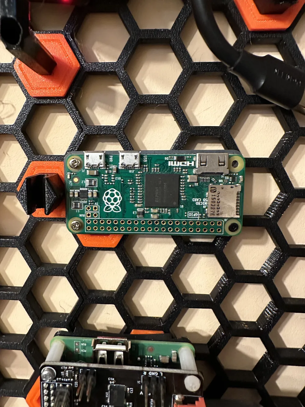 RPI Zero Honeycomb Storage Wall Mount Remixed by Jeffrey - MakerWorld