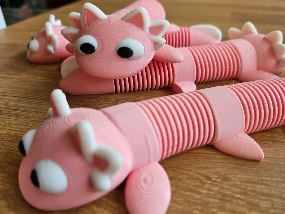 cute SLINKY AXOLOTL super flexi by MadMonkey3D MakerWorld: Download Free 3D Models