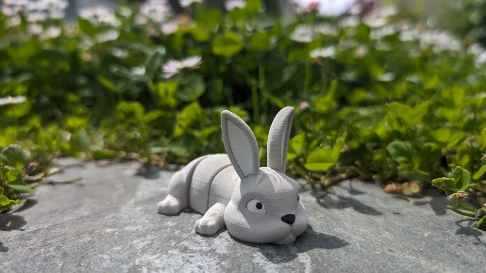 Rabbit - Articulated Figure Keychain - Free 3D Print Model - MakerWorld
