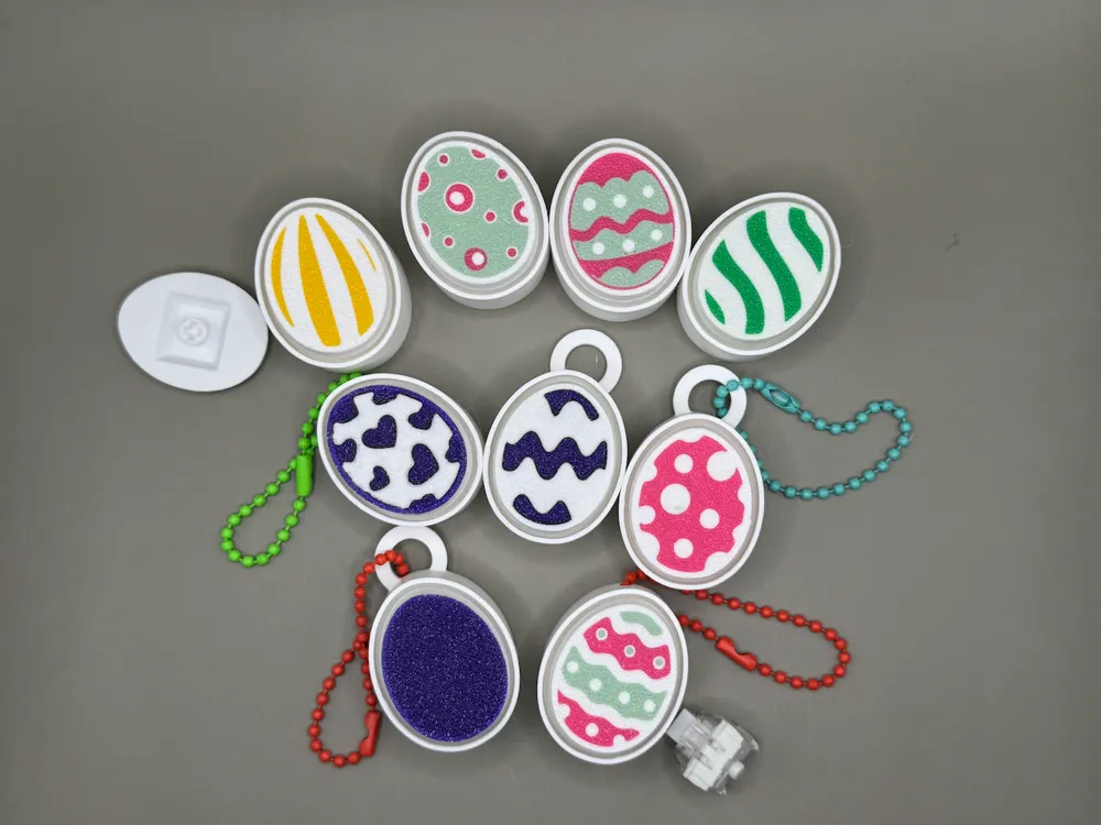 Easter Egg Fidget Clickers + keychain - Free 3D Print Model - MakerWorld