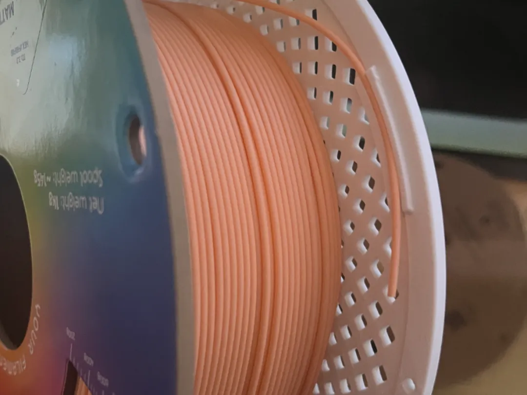 Beginner-friendly Polymaker spool with built-in filament clips Remixed ...