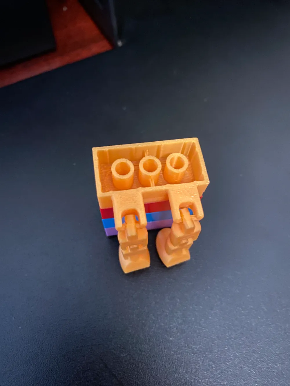 Articulated Stackable Brick Buddy (2x4) by Welch’s 3D Prints - MakerWorld