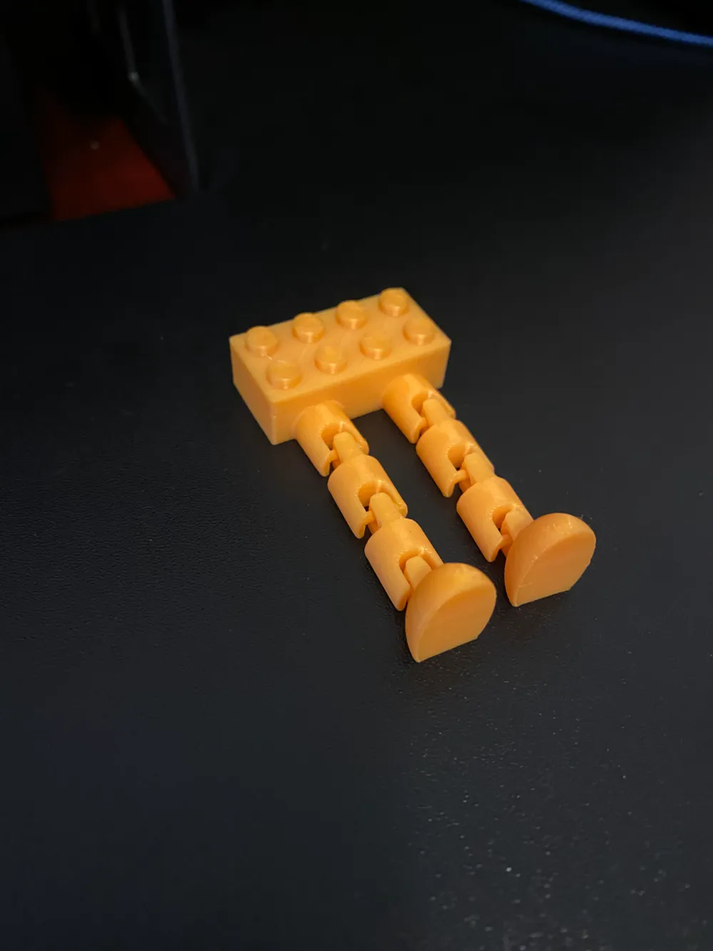 Articulated Stackable Brick Buddy (2x4) by Welch’s 3D Prints - MakerWorld