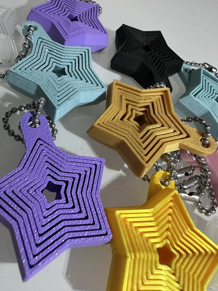Star-Shaped Fidget Keychain - Free 3D Print Model - MakerWorld