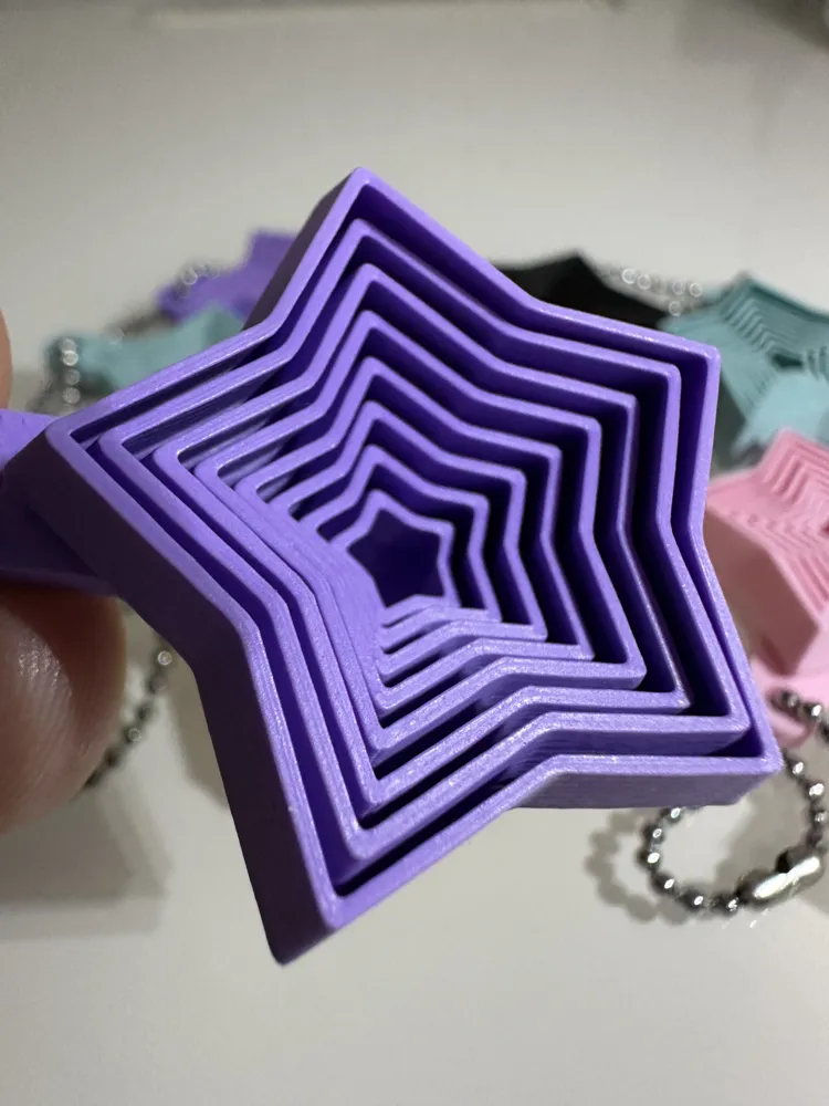 Star-Shaped Fidget Keychain - Free 3D Print Model - MakerWorld