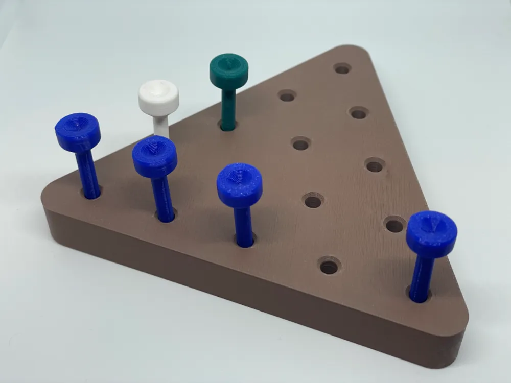 Triangle Peg Game by Austin TriggsMakerWorld: Download Free 3D Models