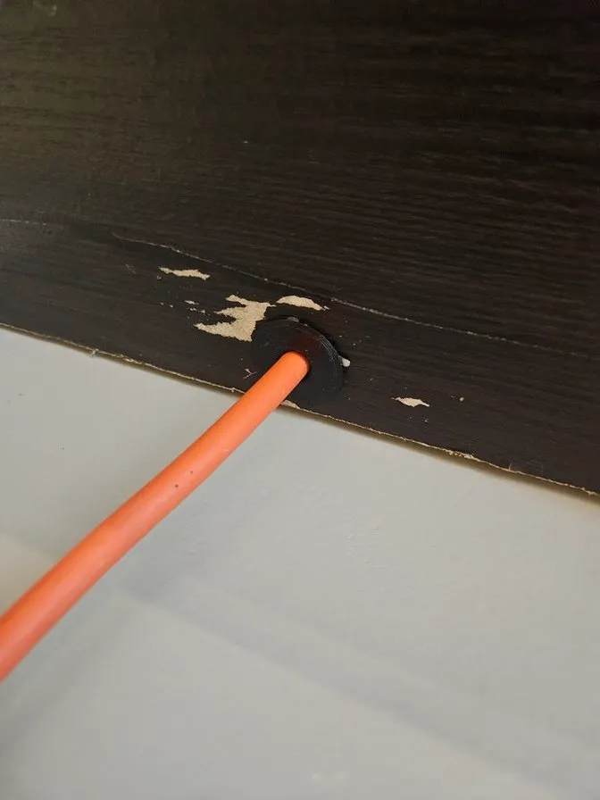 Extension cord pass through grommet by clpontius - MakerWorld