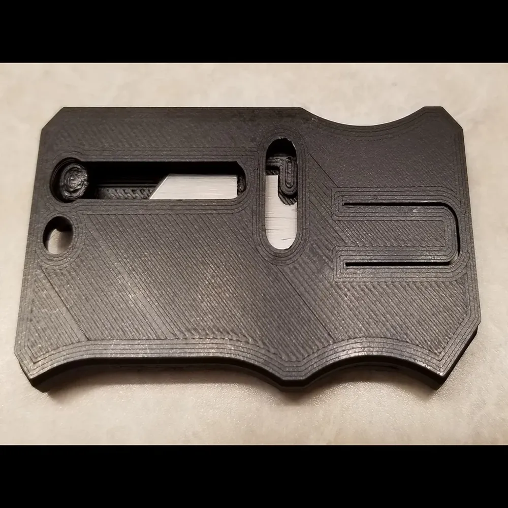 retractable razor blade by gunnarbeddoes - MakerWorld