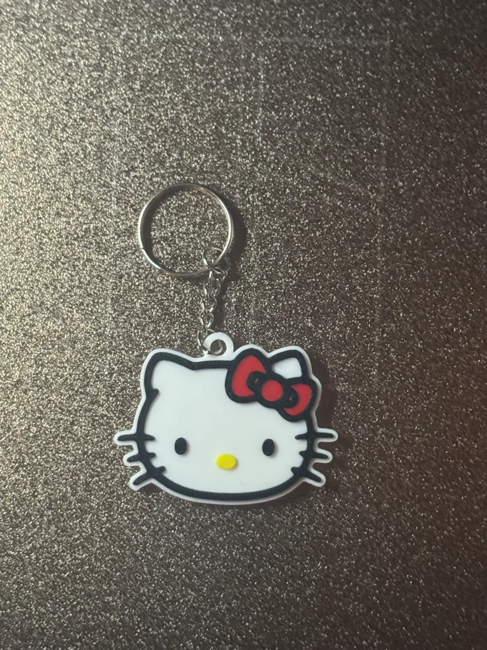 Hello Kitty face keychain - Free 3D Print Model - MakerWorld