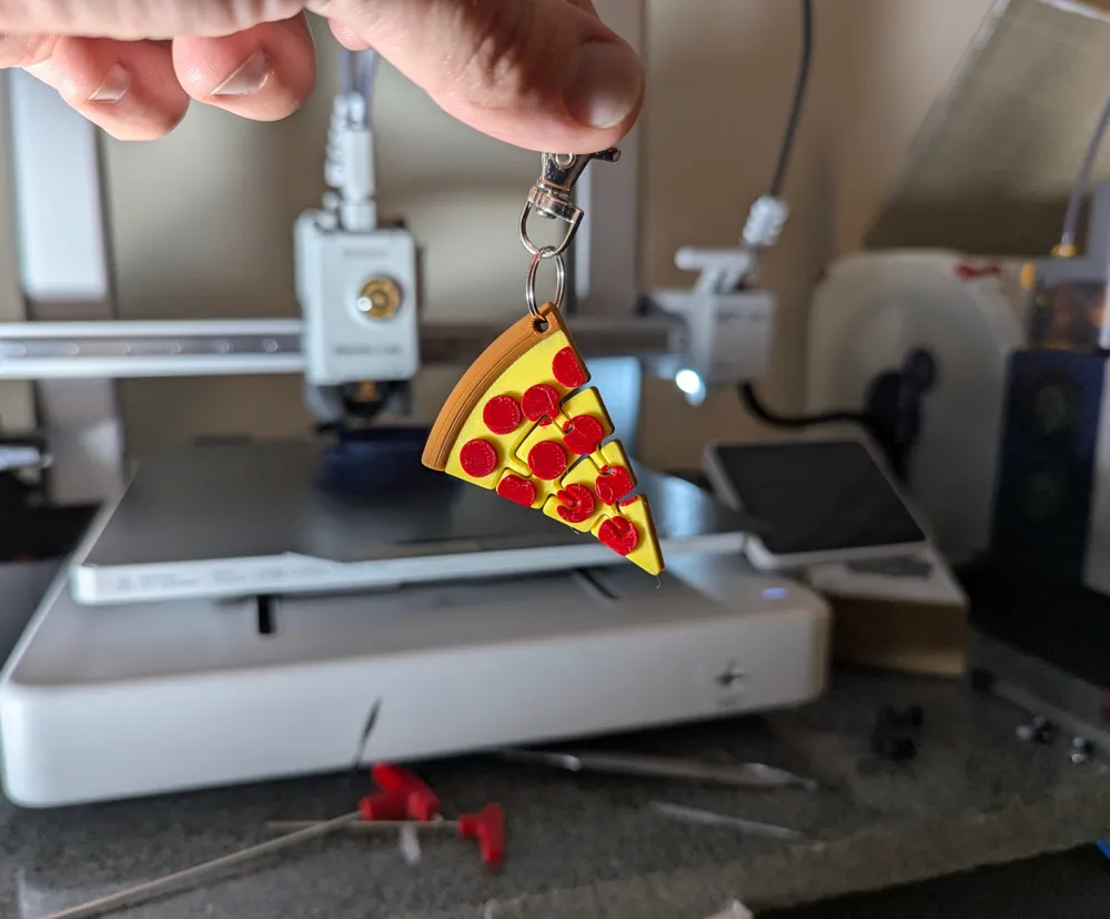 Flexi Pizza Slice Keychain Fidget (Print-in-place) by GINo MakerWorld: Download Free 3D Models