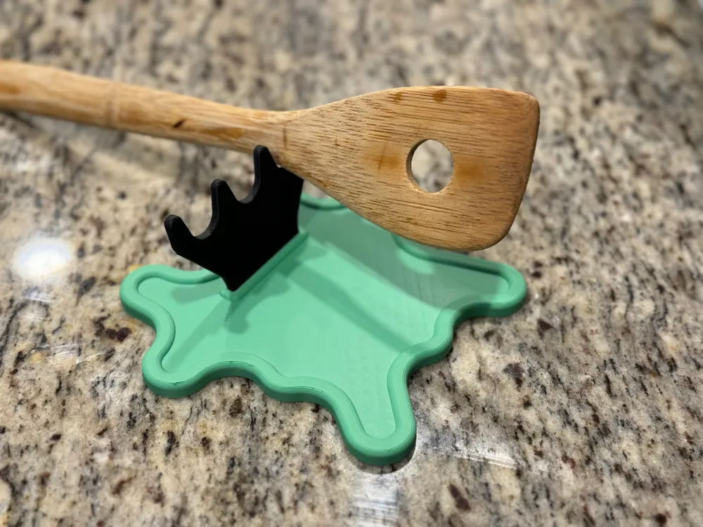 Spill Shaped Spoon Rest Holder by MottN. - MakerWorld