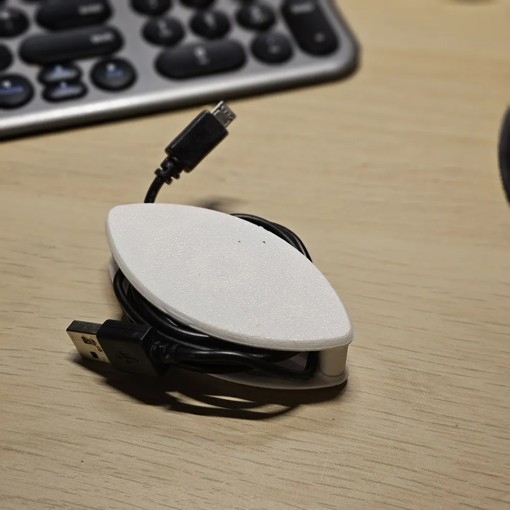 USB ratcheting cable winder by Logr47 - MakerWorld