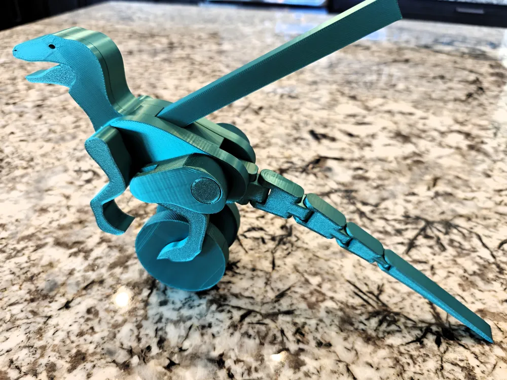 Mechanical Articulated Velociraptor - Free 3D Print Model - MakerWorld