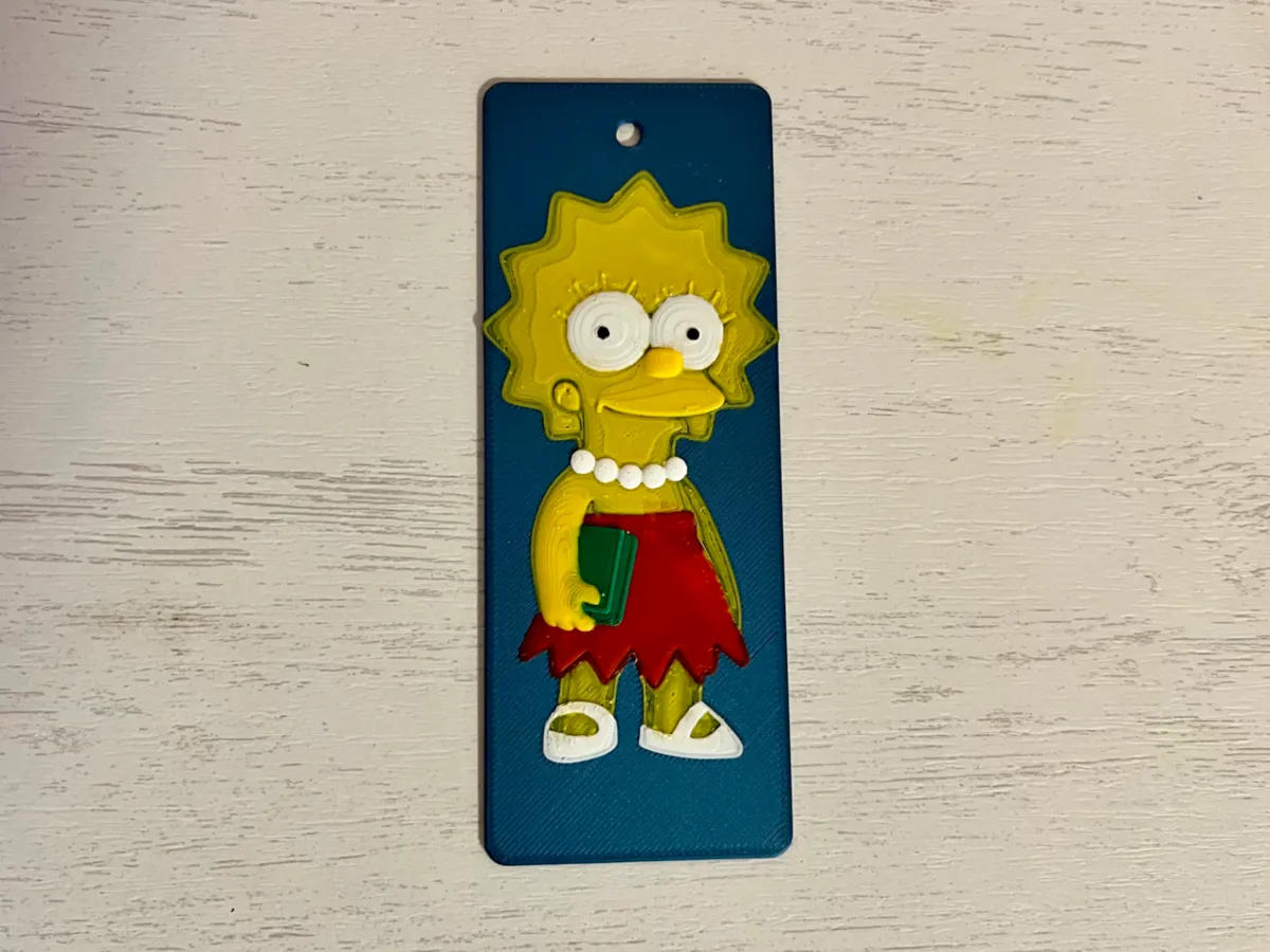 Lisa Simpson Bookmark AMS Holding a Book - Free 3D Print Model - MakerWorld