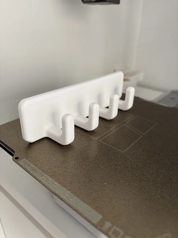 Universal 4-Hook Hanger by Szamot MakerWorld: Download Free 3D Models