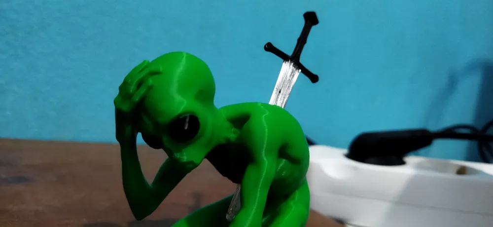 Dying Alien in Pain by Sword - Free 3D Print Model - MakerWorld