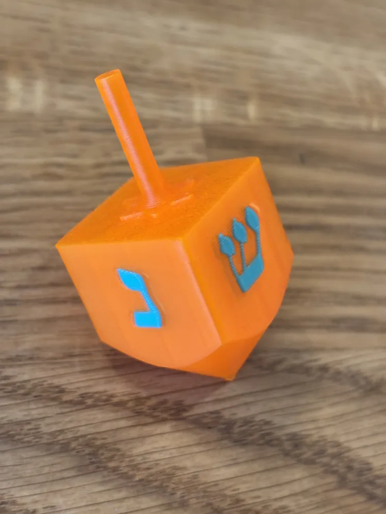 Chanukkah dreidel with colored letters - Free 3D Print Model - MakerWorld