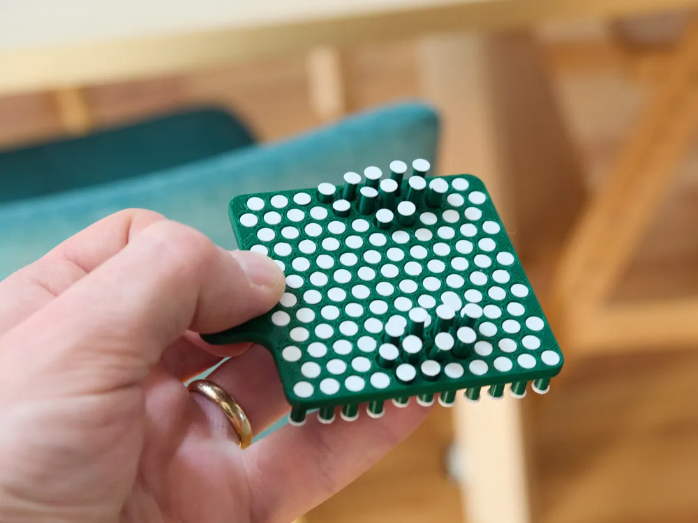 Handheld pin art fidget toy by pearigee MakerWorld: Download Free 3D Models