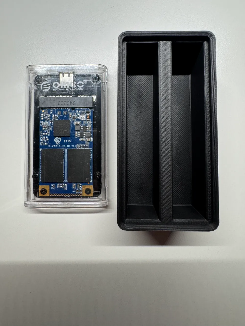 M.2 SATA SSD Case Holder - Gridfinity by JlKlR - MakerWorld