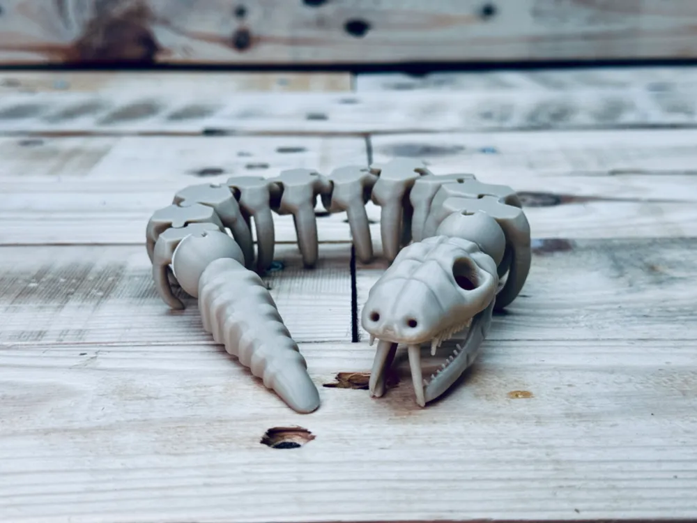Mini Snake Skeleton by ENIQUE3D - MakerWorld