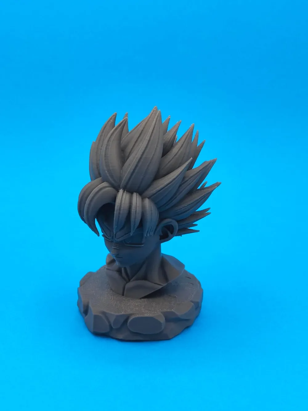 Goku Super Saiyan Head on Base - Free 3D Print Model - MakerWorld