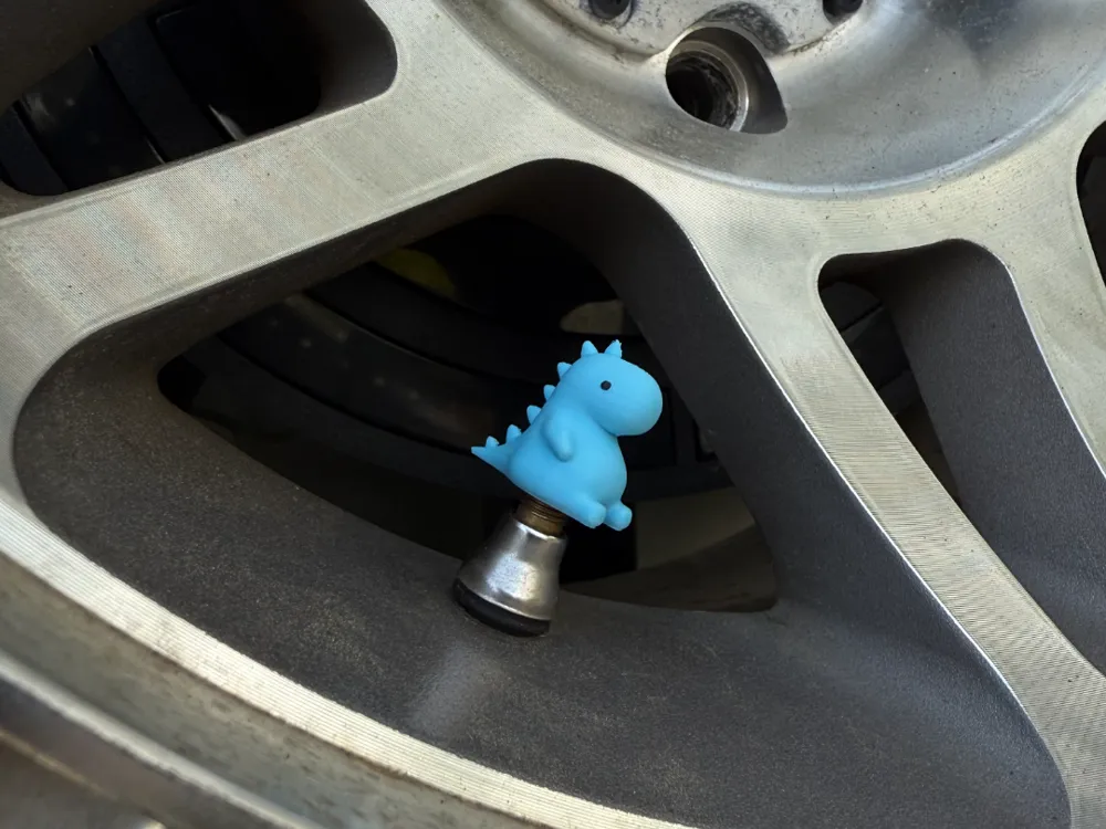 Valve Stem Caps : Small Sitting Dino! - Free 3D Print Model - MakerWorld
