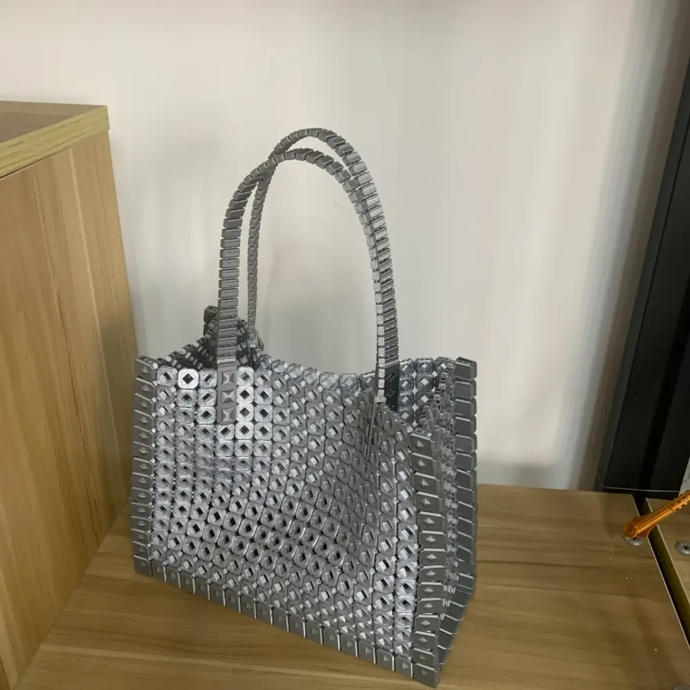 Fully 3D printed flexible handbag by 发明狂徒林林七 - MakerWorld